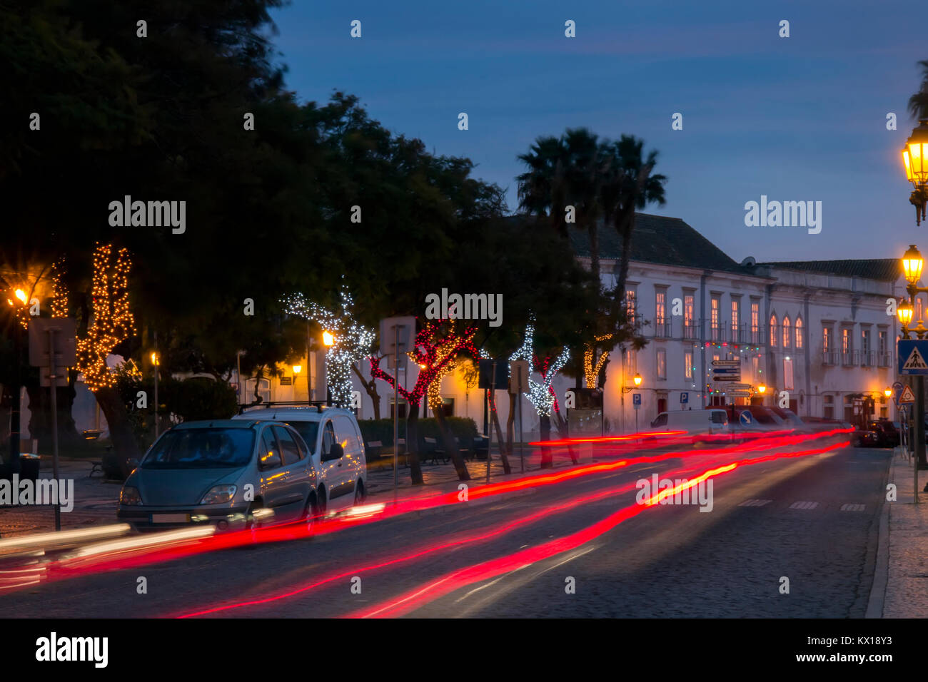 Intense traffic in Faro city near the marina at sunset Stock Photo - Alamy