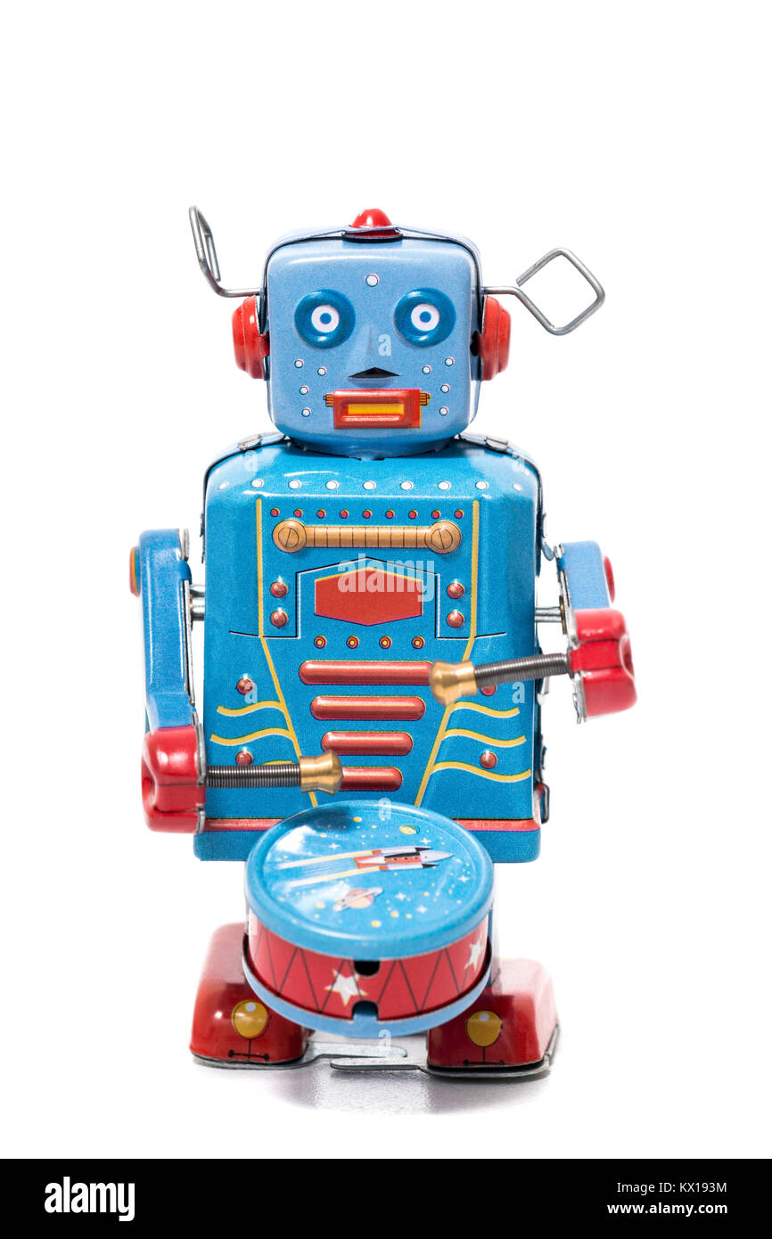 Vintage tin robot toy isolated on a white background Stock Photo - Alamy