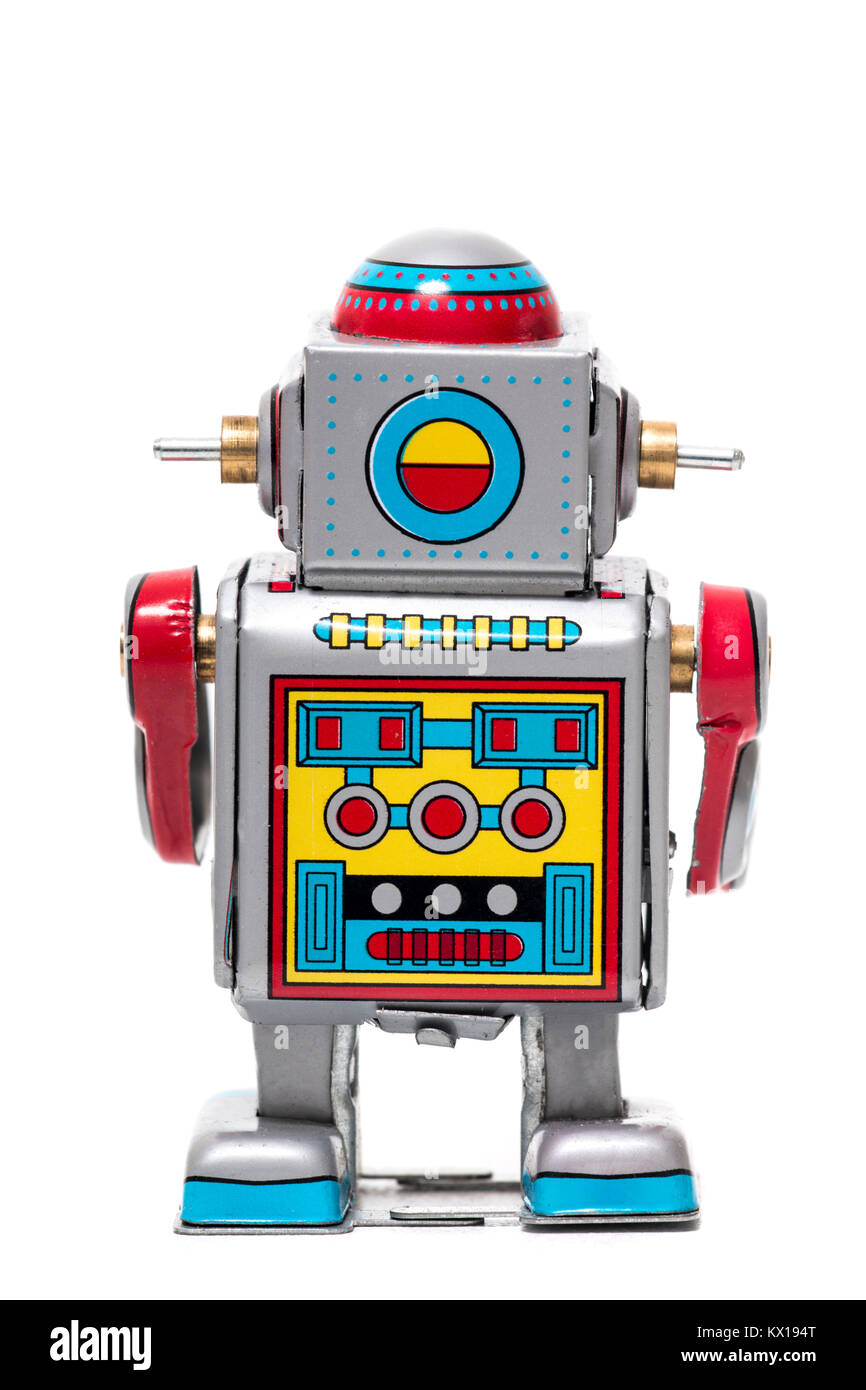 Vintage tin robot toy isolated on a white background Stock Photo - Alamy