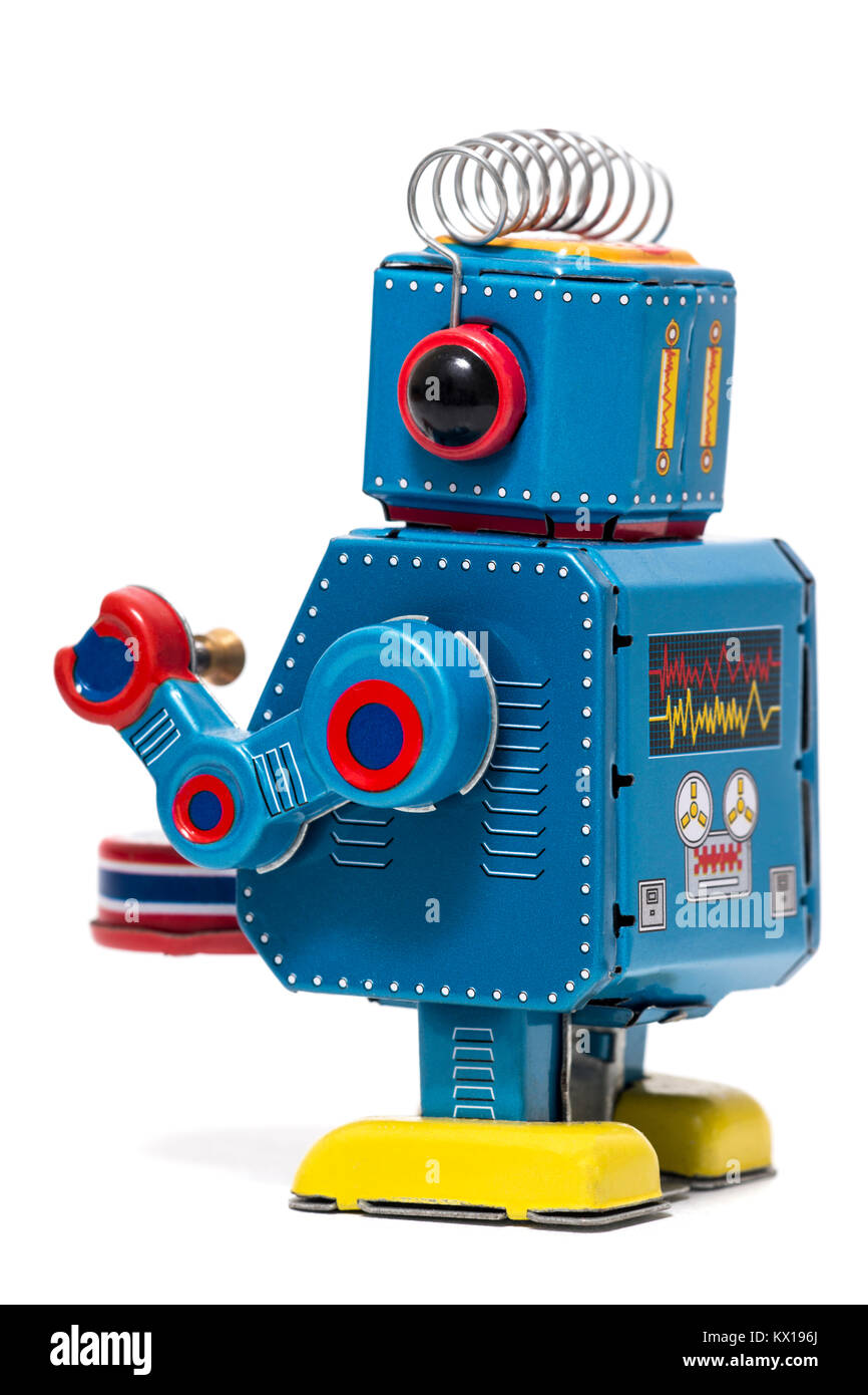 Vintage tin robot toy isolated on a white background Stock Photo - Alamy