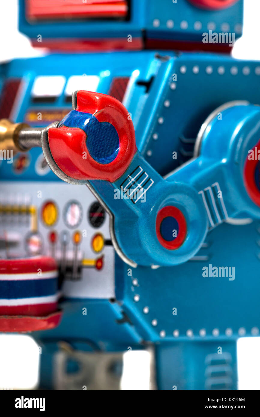 Vintage tin robot toy isolated on a white background Stock Photo - Alamy