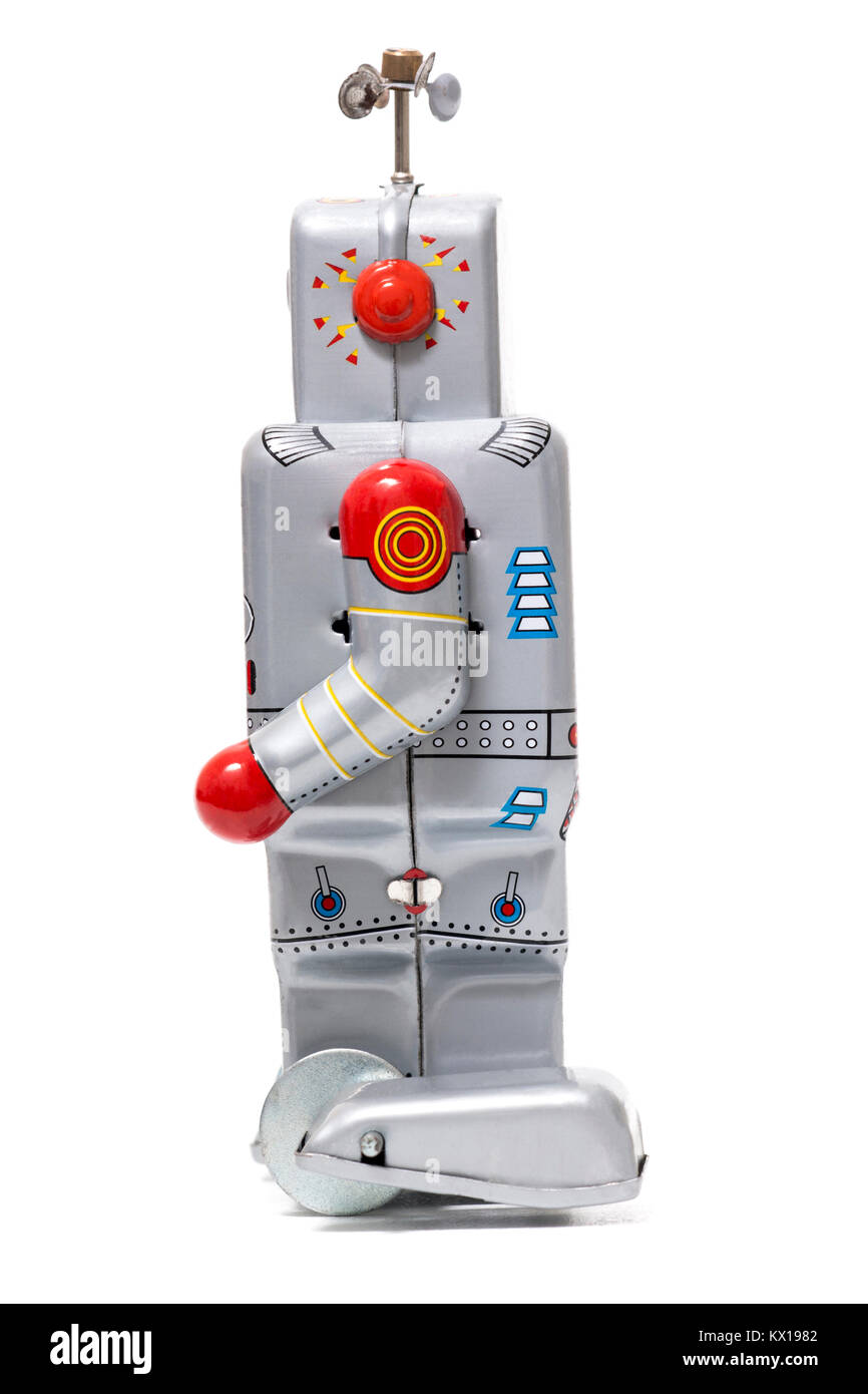 Vintage tin robot toy isolated on a white background Stock Photo - Alamy