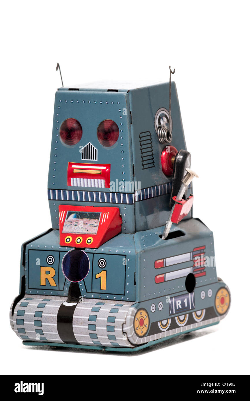 Vintage tin robot toy isolated on a white background Stock Photo - Alamy