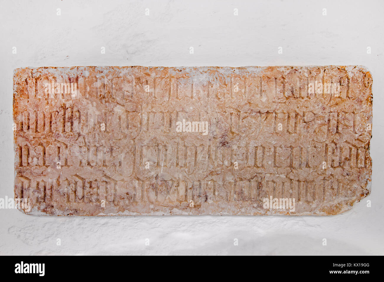 Close up view of ancient latin carved text on a stone Stock Photo - Alamy