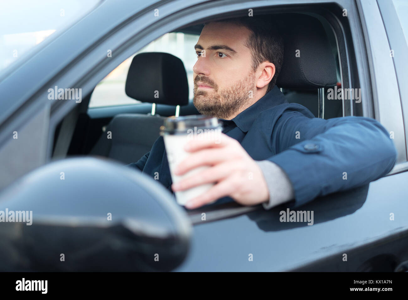 Man drinking coffee driving car hi-res stock photography and images - Alamy