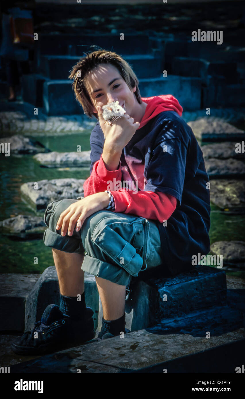Young German boy in town square with pet rat Stock Photo - Alamy