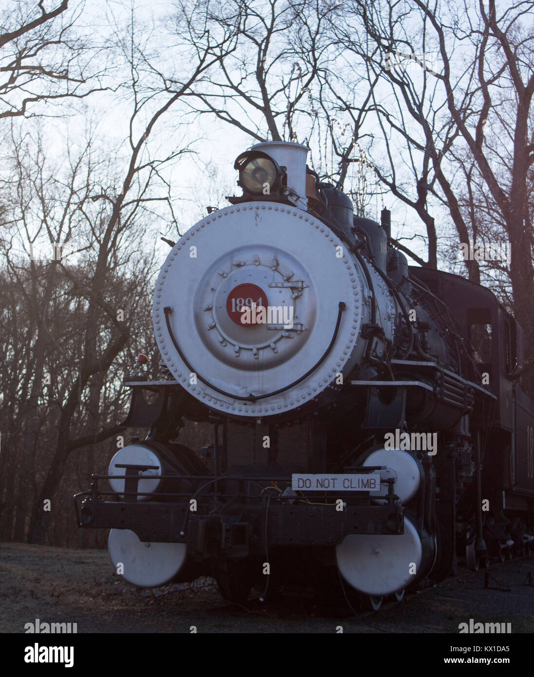 A 19th century train at dusk Stock Photo - Alamy