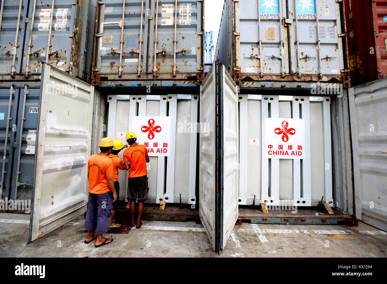 Yangon. 6th Jan, 2018. Containers carrying prefabricated houses are ...