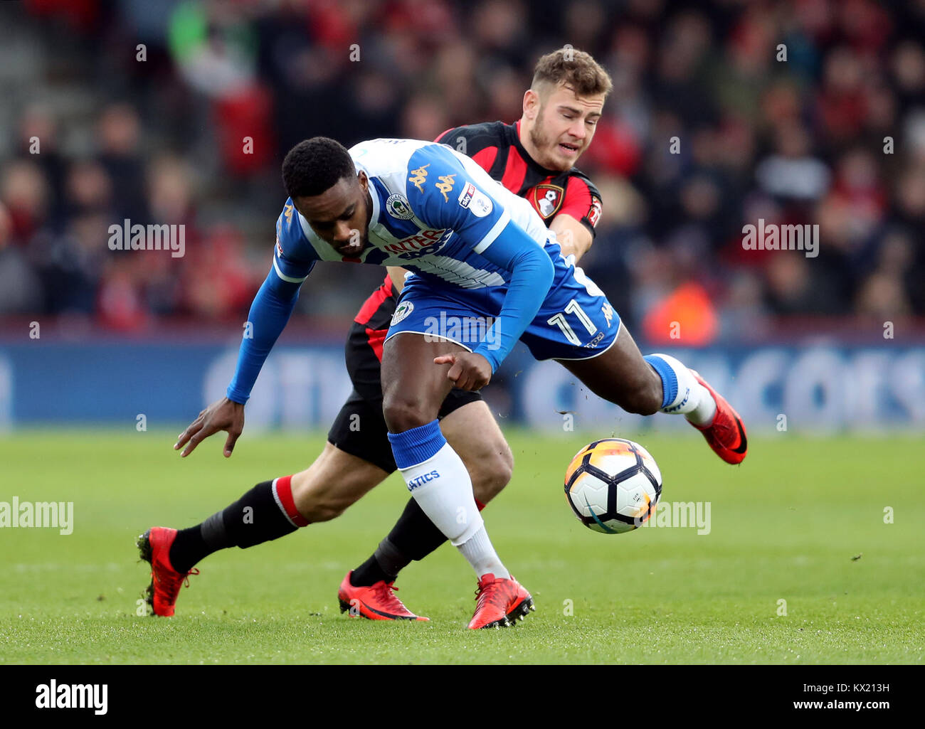 Wigan Athletic's Gavin Massey (left) and AFC Bournemouth's Ryan Fraser ...