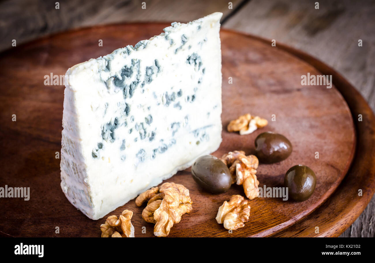 Blue cheese with walnuts Stock Photo - Alamy