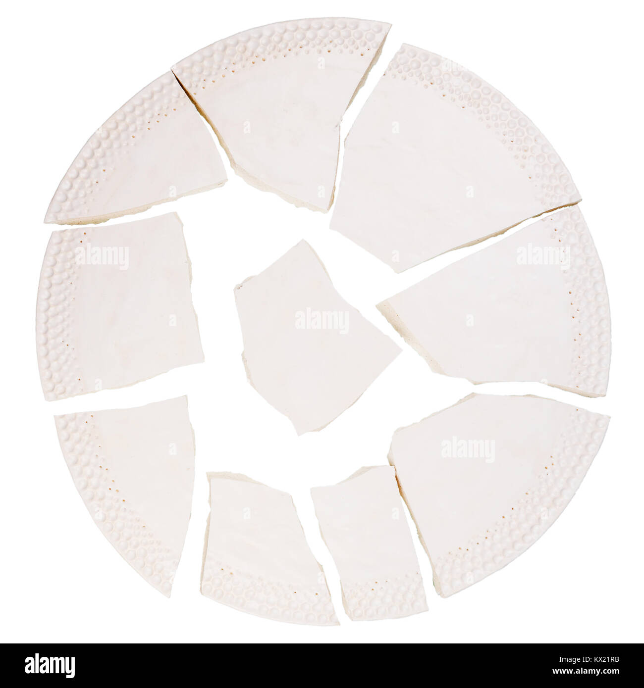 Broken ceramic plate isolated on white background Stock Photo - Alamy