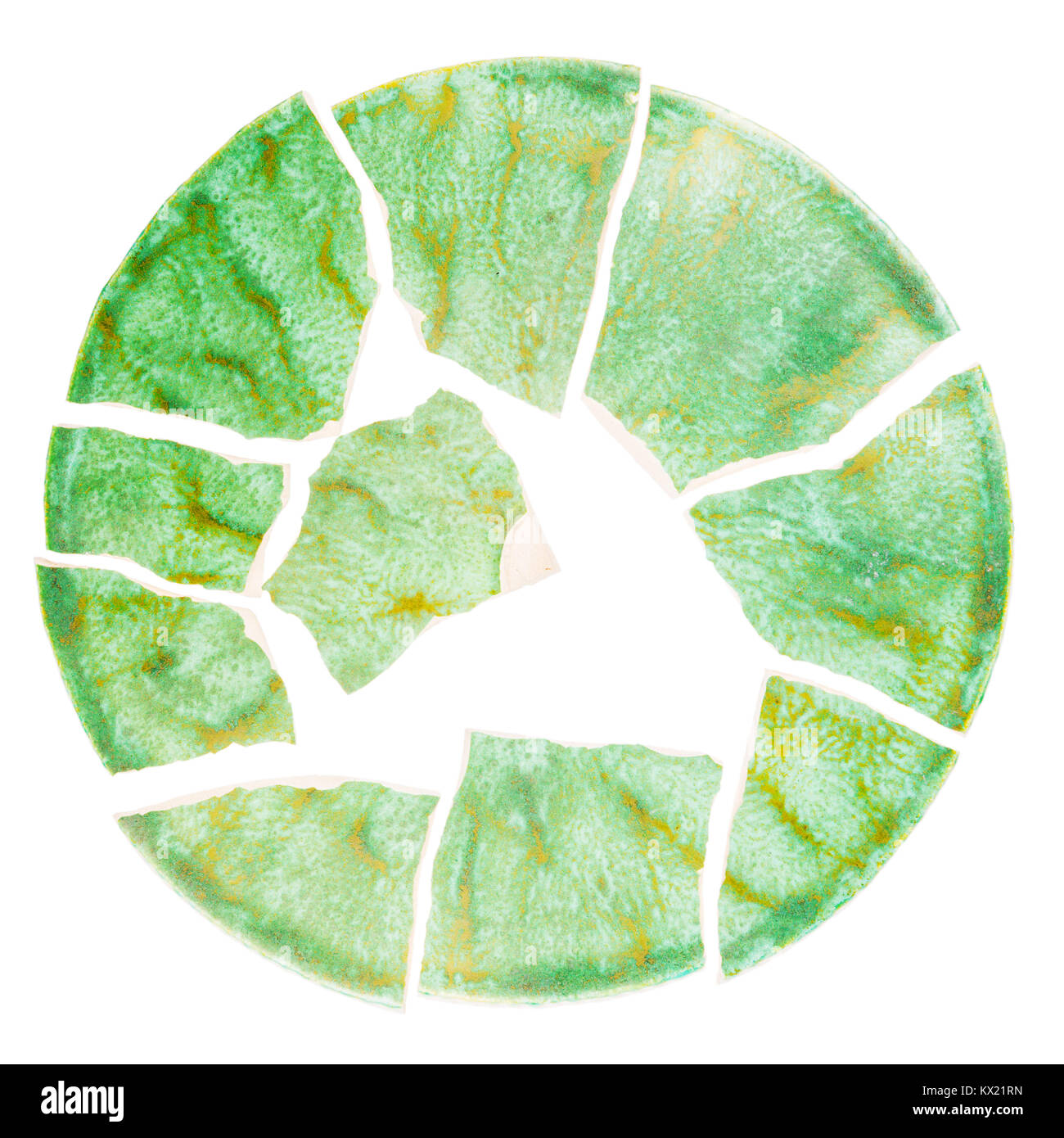 Broken green ceramic plate isolated on white background Stock Photo - Alamy