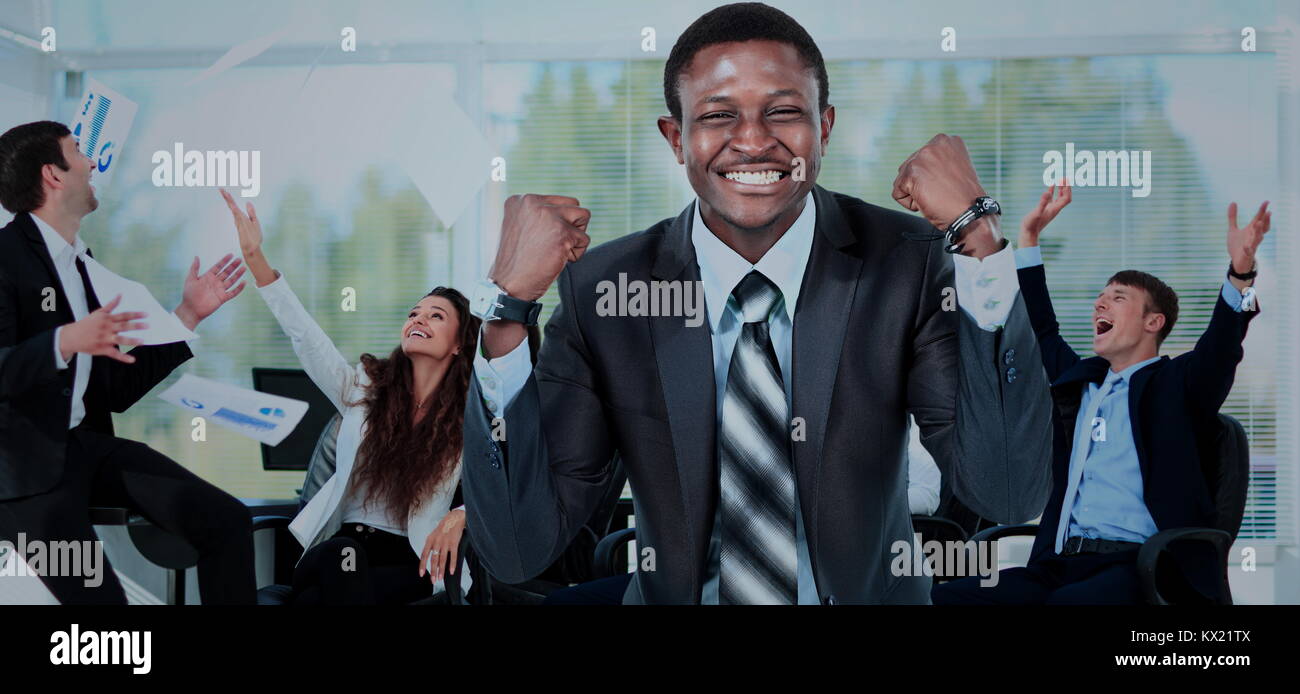 Business team celebrating a triumph with arms up Stock Photo - Alamy