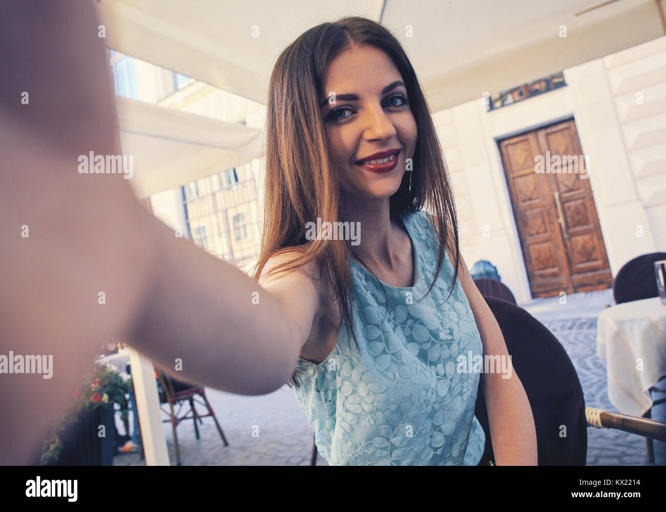 Sitting young woman taking photos hi-res stock photography and images ...