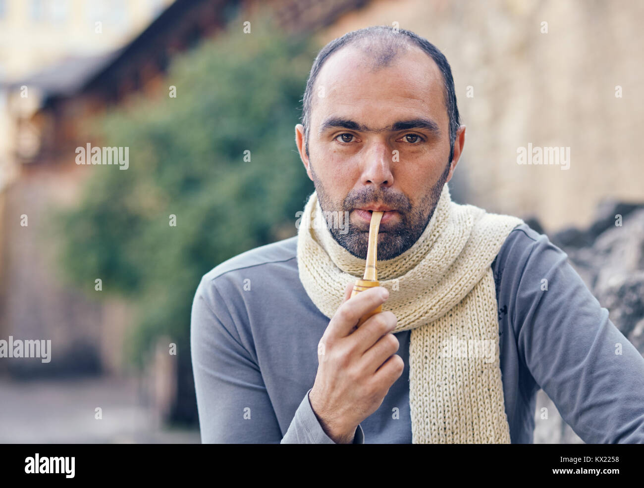 Man with a smoking pipe Stock Photo - Alamy