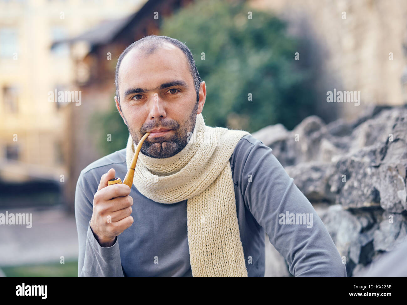 Man with a smoking pipe Stock Photo - Alamy