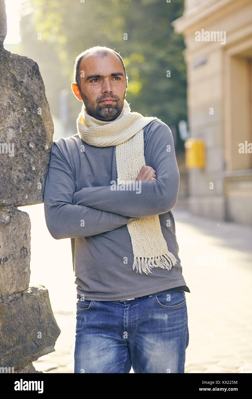 Handsome guy standing outside Stock Photo - Alamy