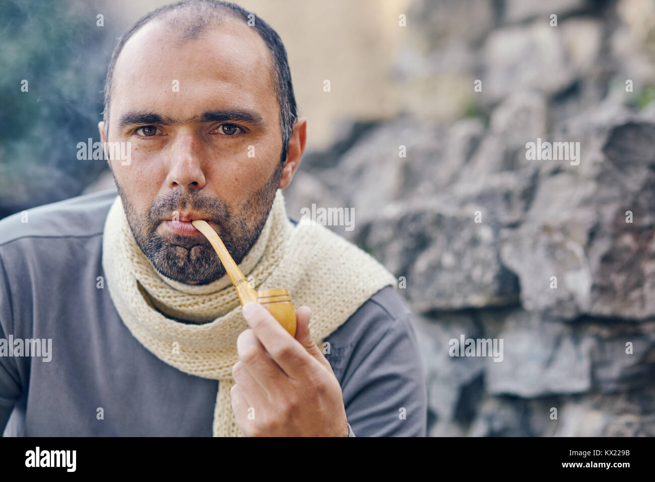 Man with a smoking pipe Stock Photo - Alamy