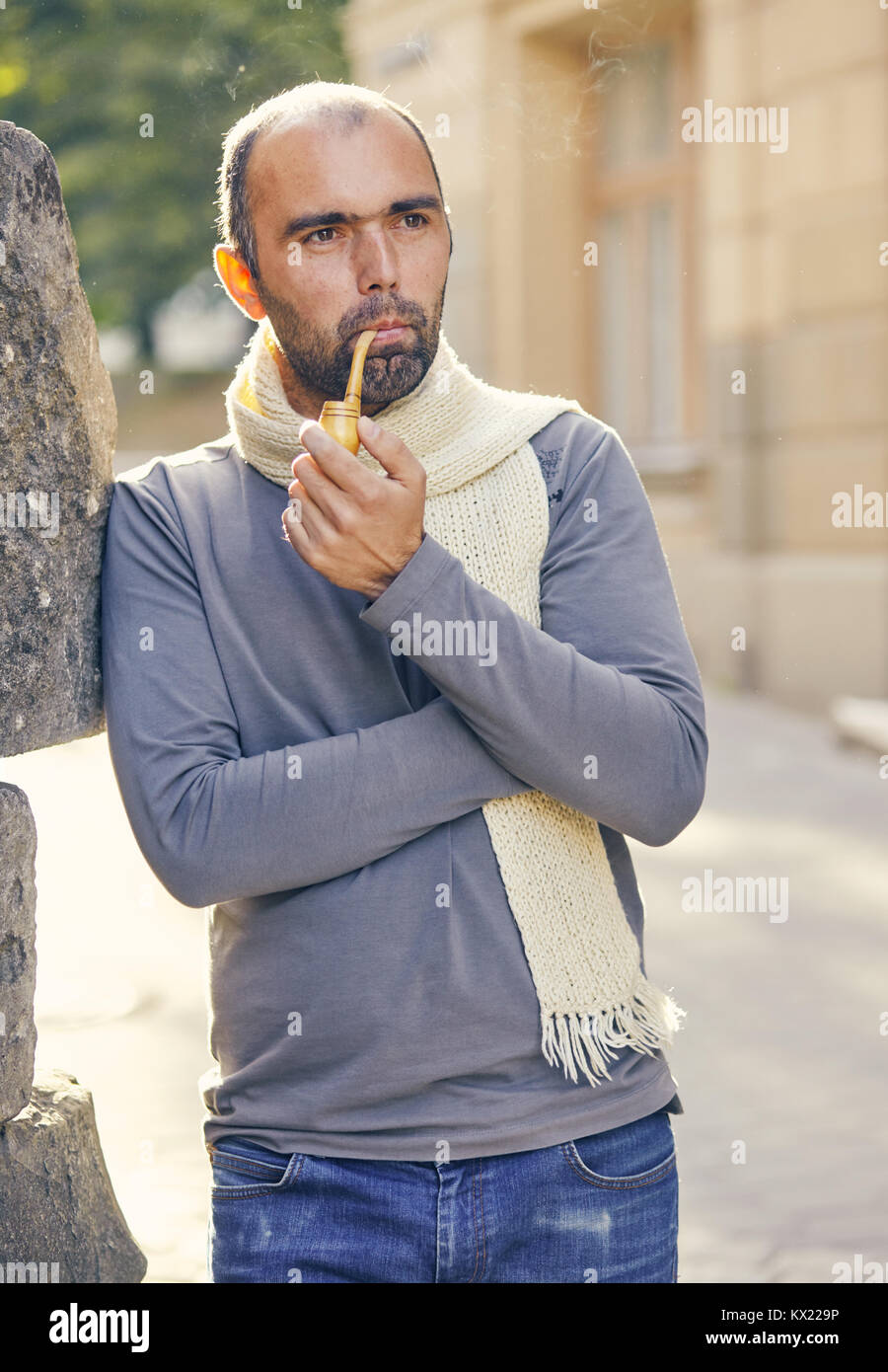Man with a smoking pipe Stock Photo - Alamy