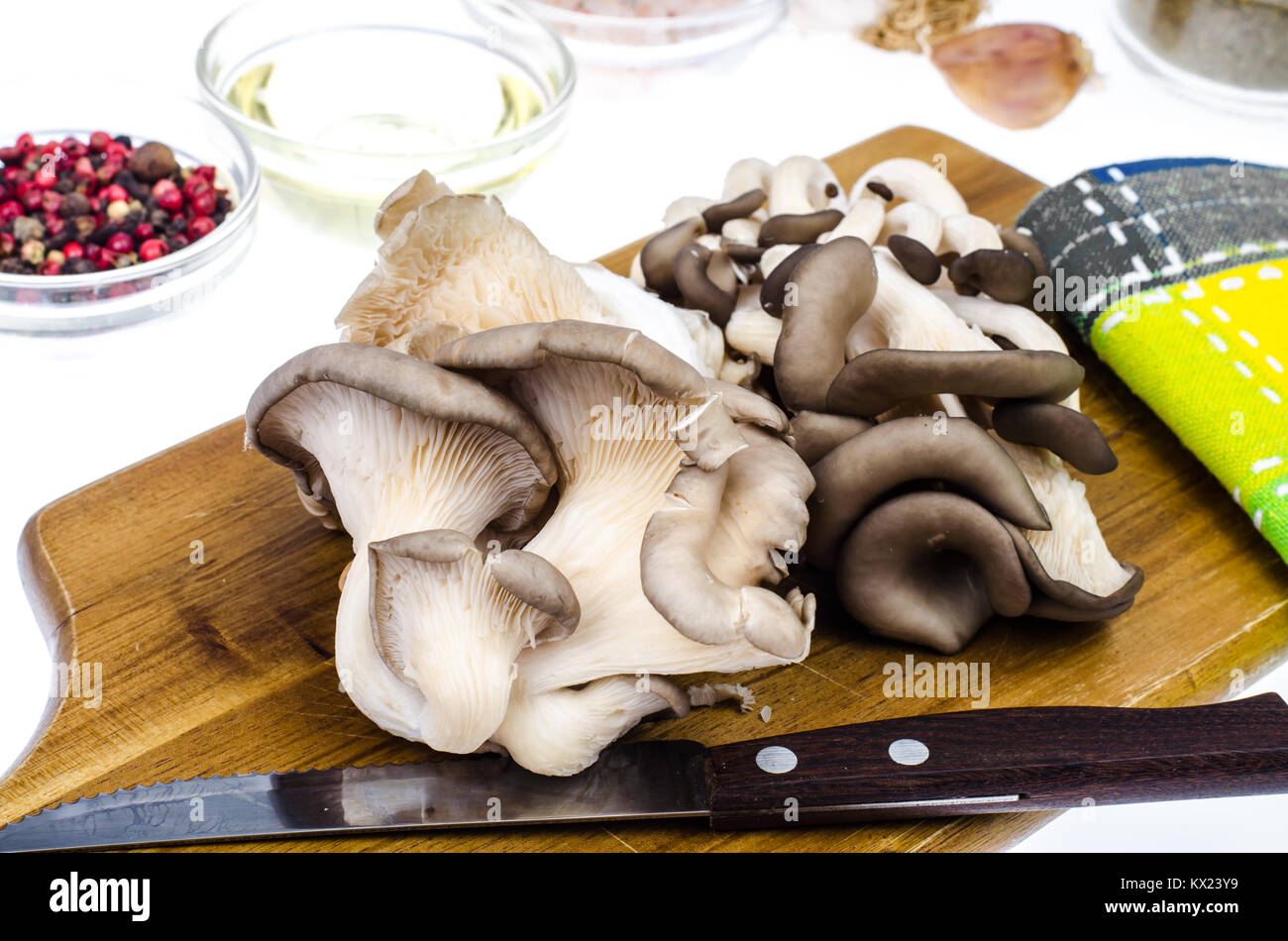Fresh mushrooms on the kitchen cutting Stock Photo - Alamy