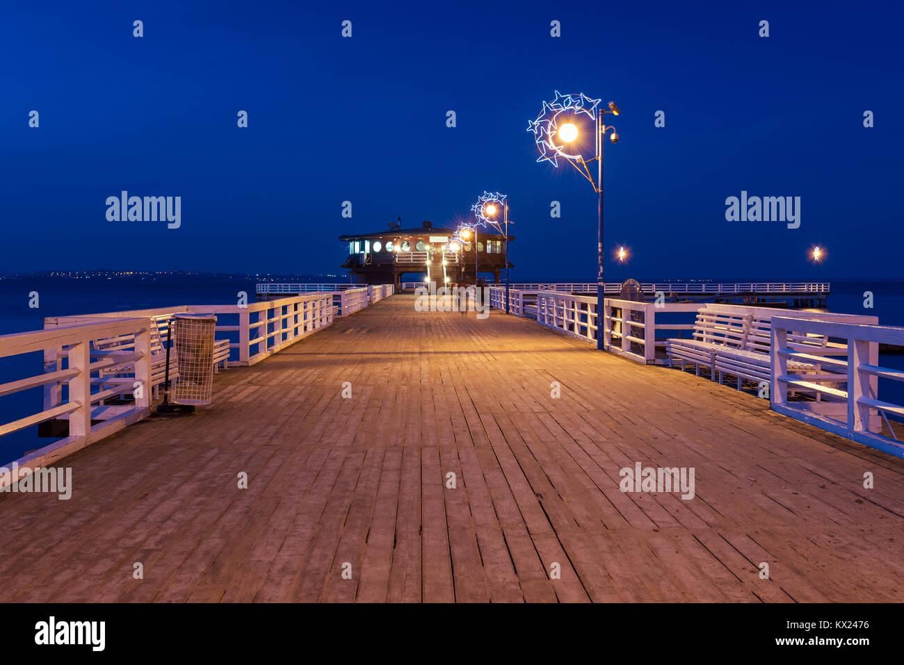Illuminated pier in Puck at night. Baltic Sea, Poland Stock Photo - Alamy