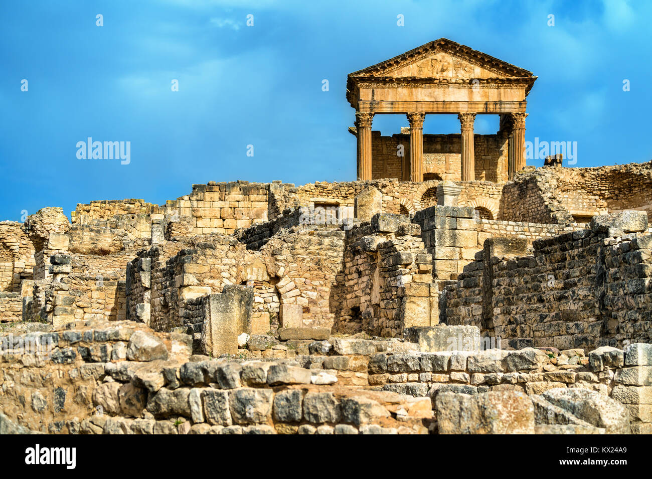 The Roman Capitol at Dougga. UNESCO heritage site in Tunisia Stock ...