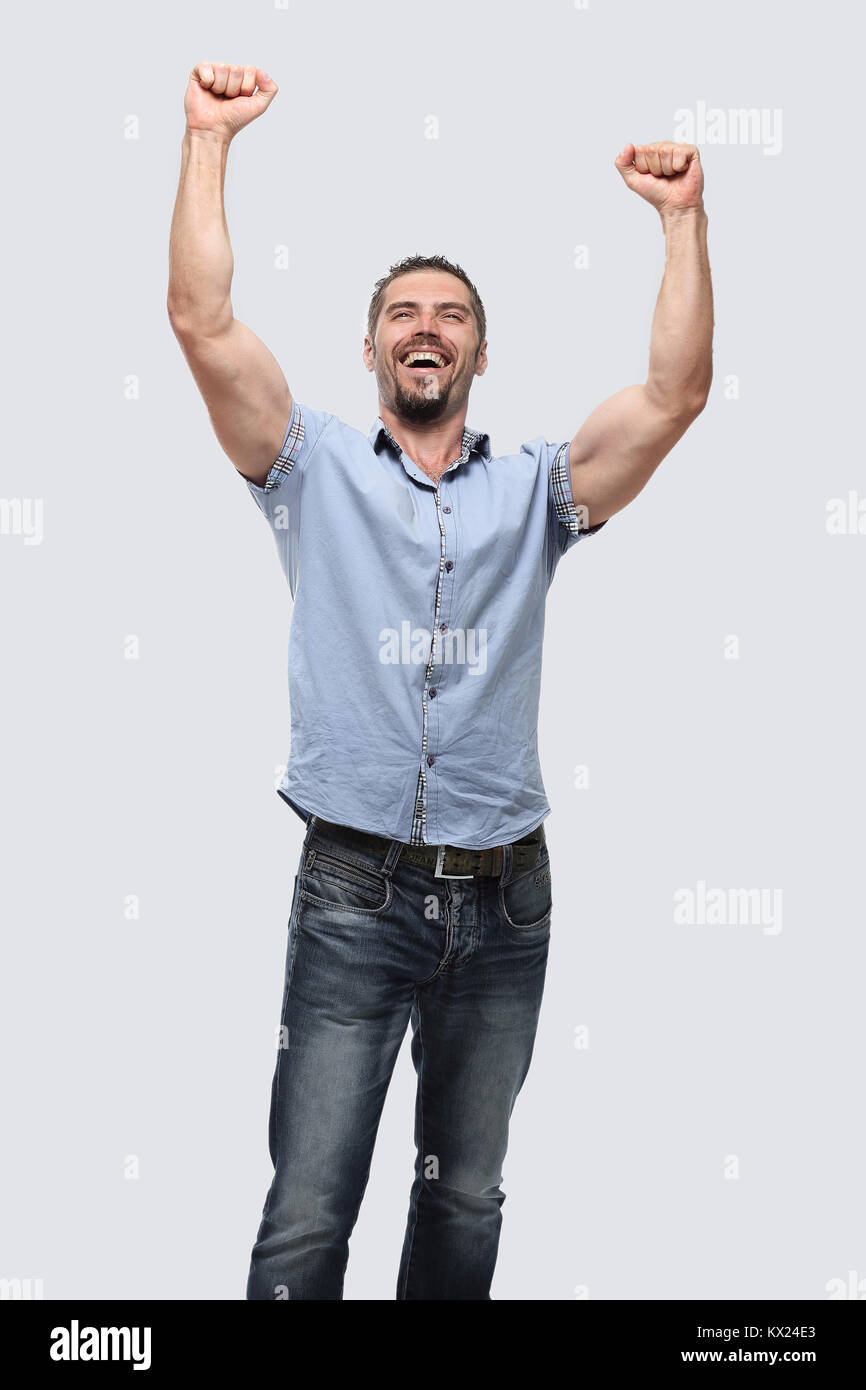very happy modern man.isolated on a light background Stock Photo - Alamy