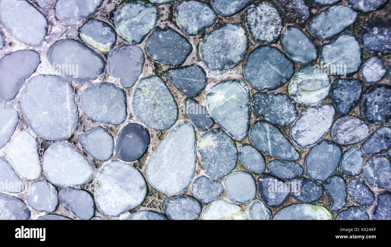 Texture, background of small round gray stones Stock Photo - Alamy