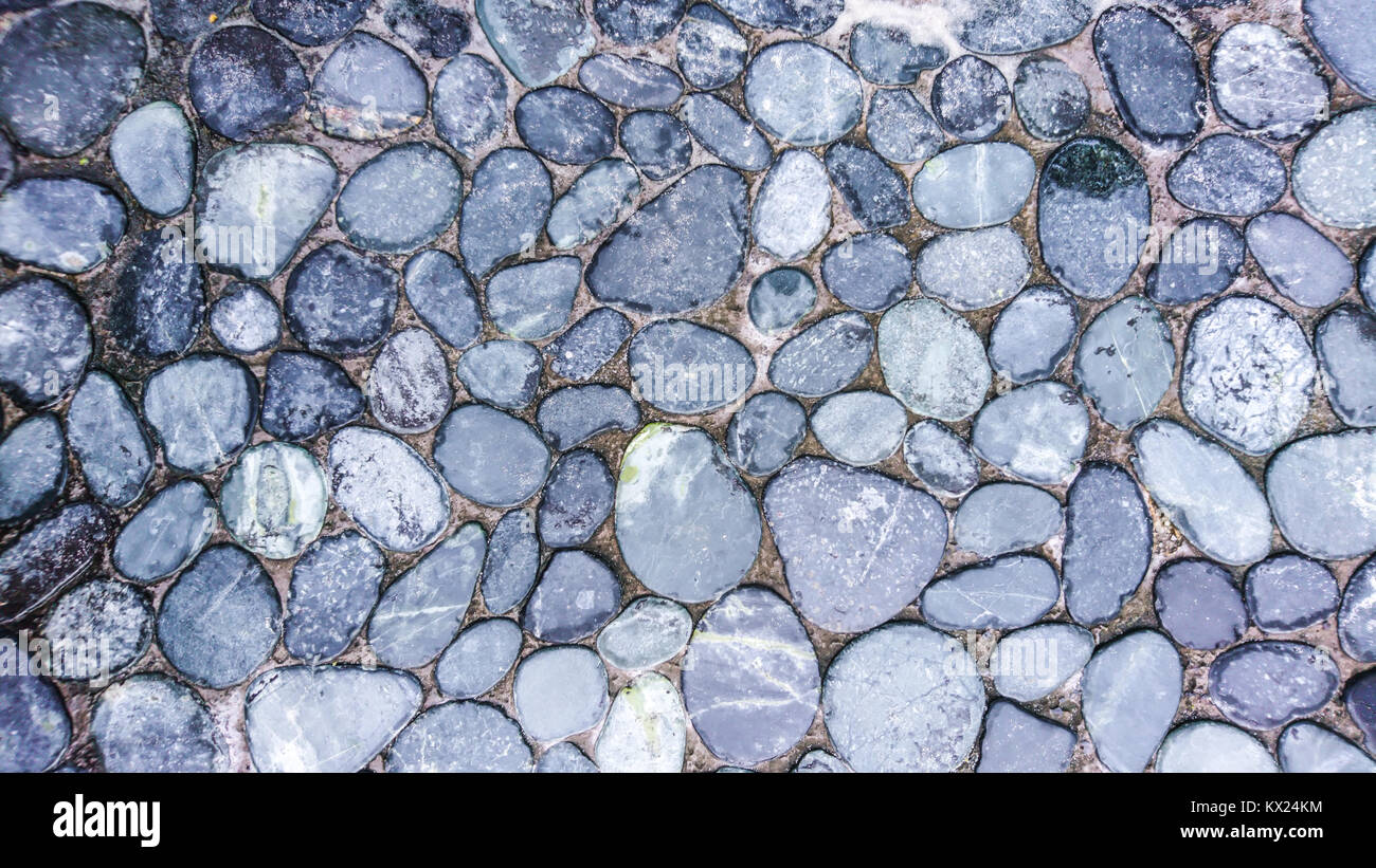 Texture, background of small round gray stones Stock Photo - Alamy