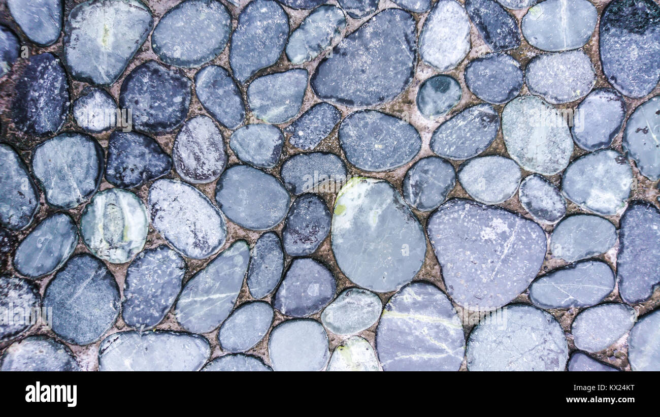 Texture, background of small round gray stones Stock Photo - Alamy