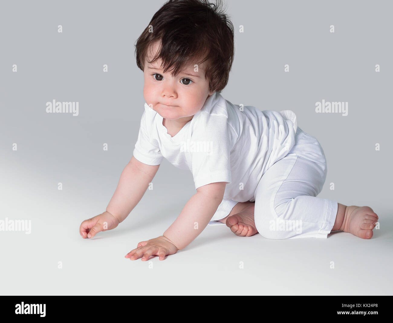 Person crawling on hands and knees hi-res stock photography and images ...