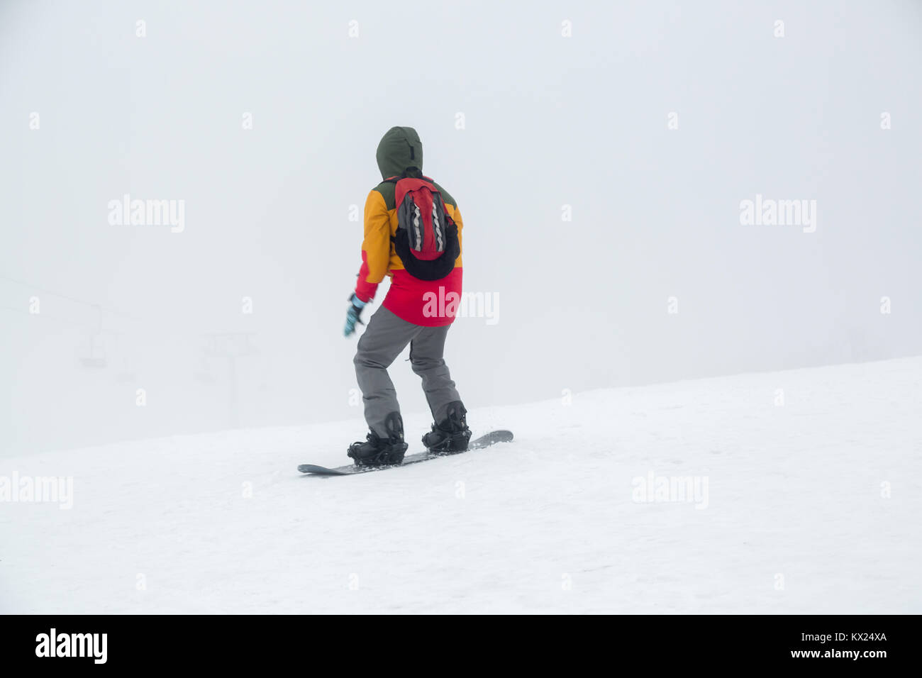 Snowboarding on the slope Stock Photo - Alamy