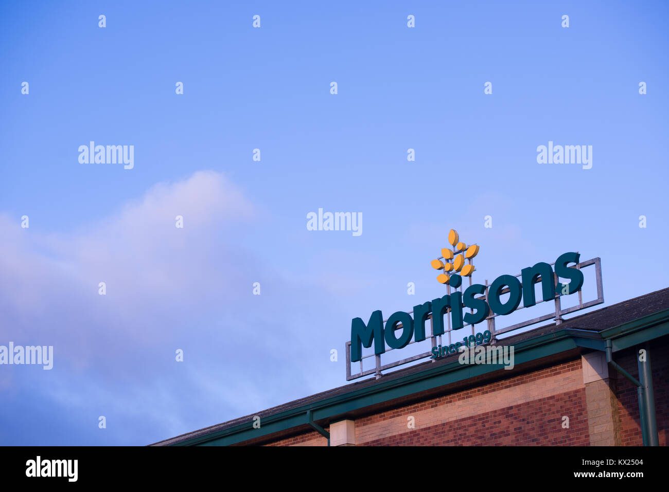 Morrisons supermarket sign with blue sky in Nelson, Lancashire Stock ...