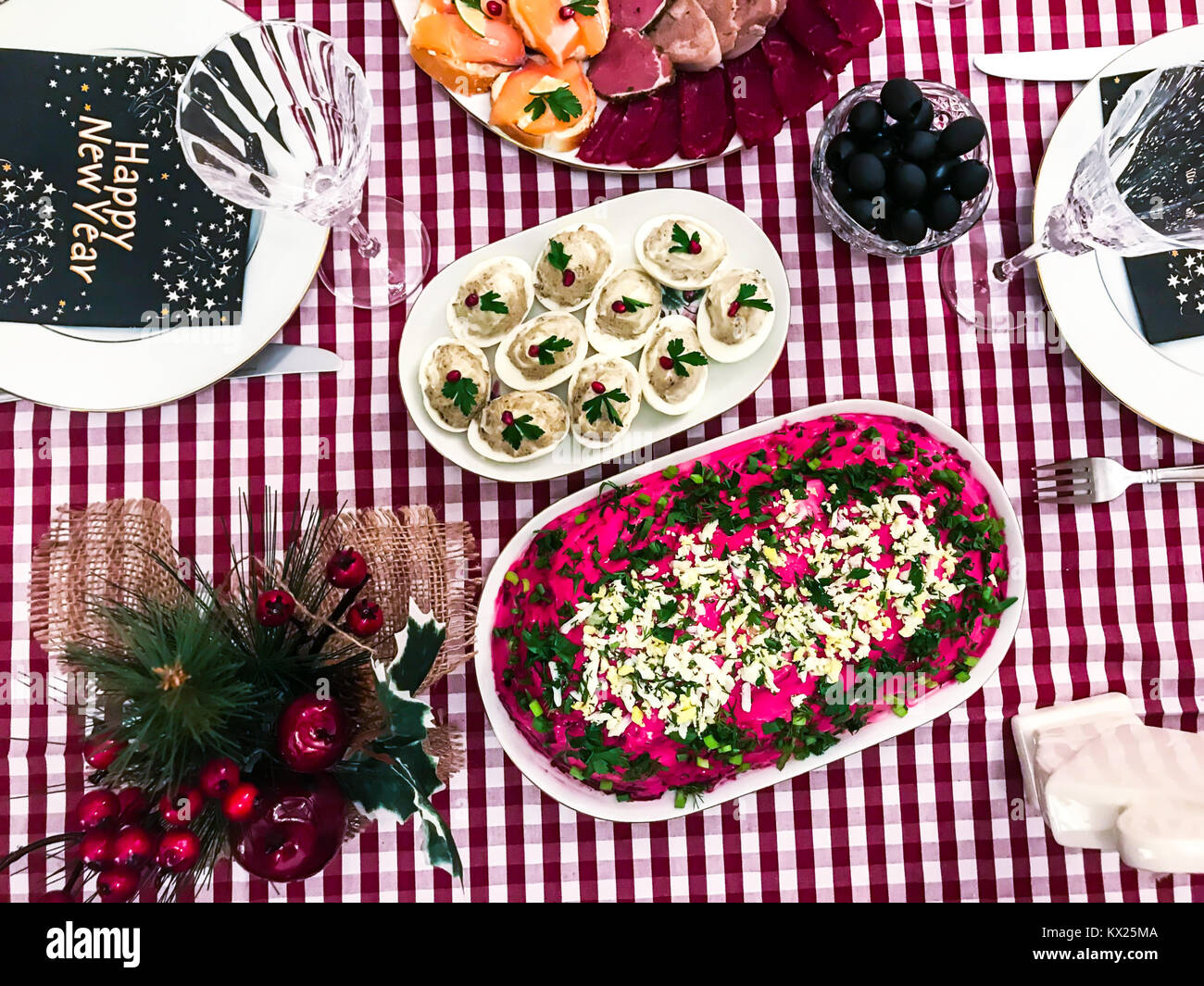Festive dishes on the New Year's table Stock Photo - Alamy