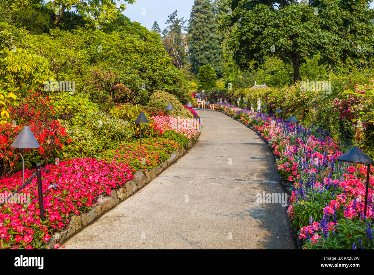 Tourists in Butchart Gardens in Victoria, British Columbia, Canada a ...
