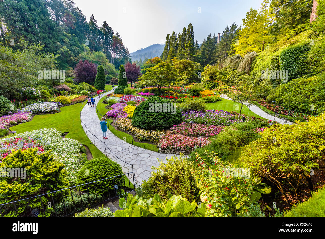 Tourists in Butchart Gardens in Victoria, British Columbia, Canada a ...