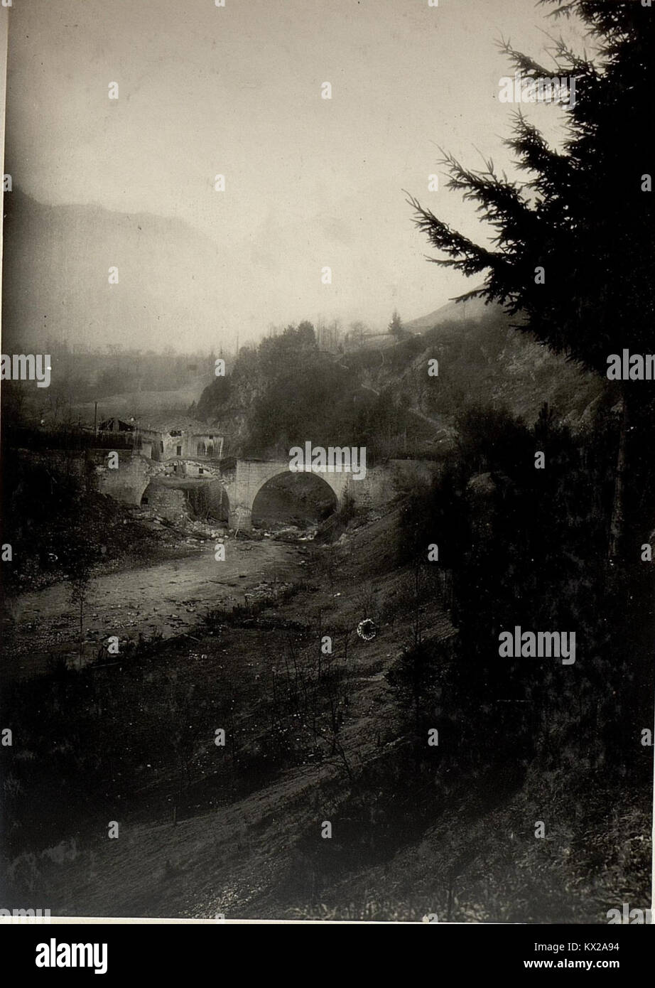 This image depicts the half-destroyed stone bridge over the Isonzo ...