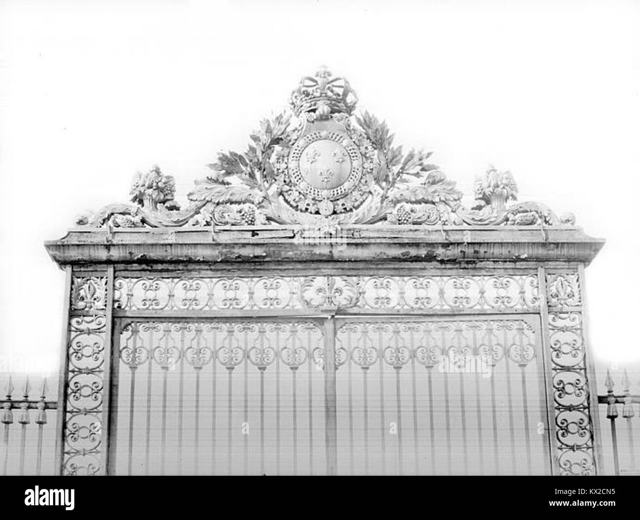 This image shows the east grand gate of the Château de Versailles, part ...