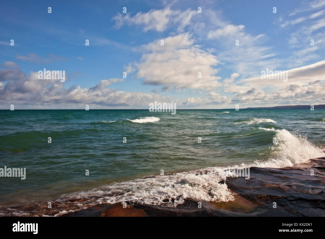 Various autumn clouds form over Lake Superior along Pictured Rocks ...