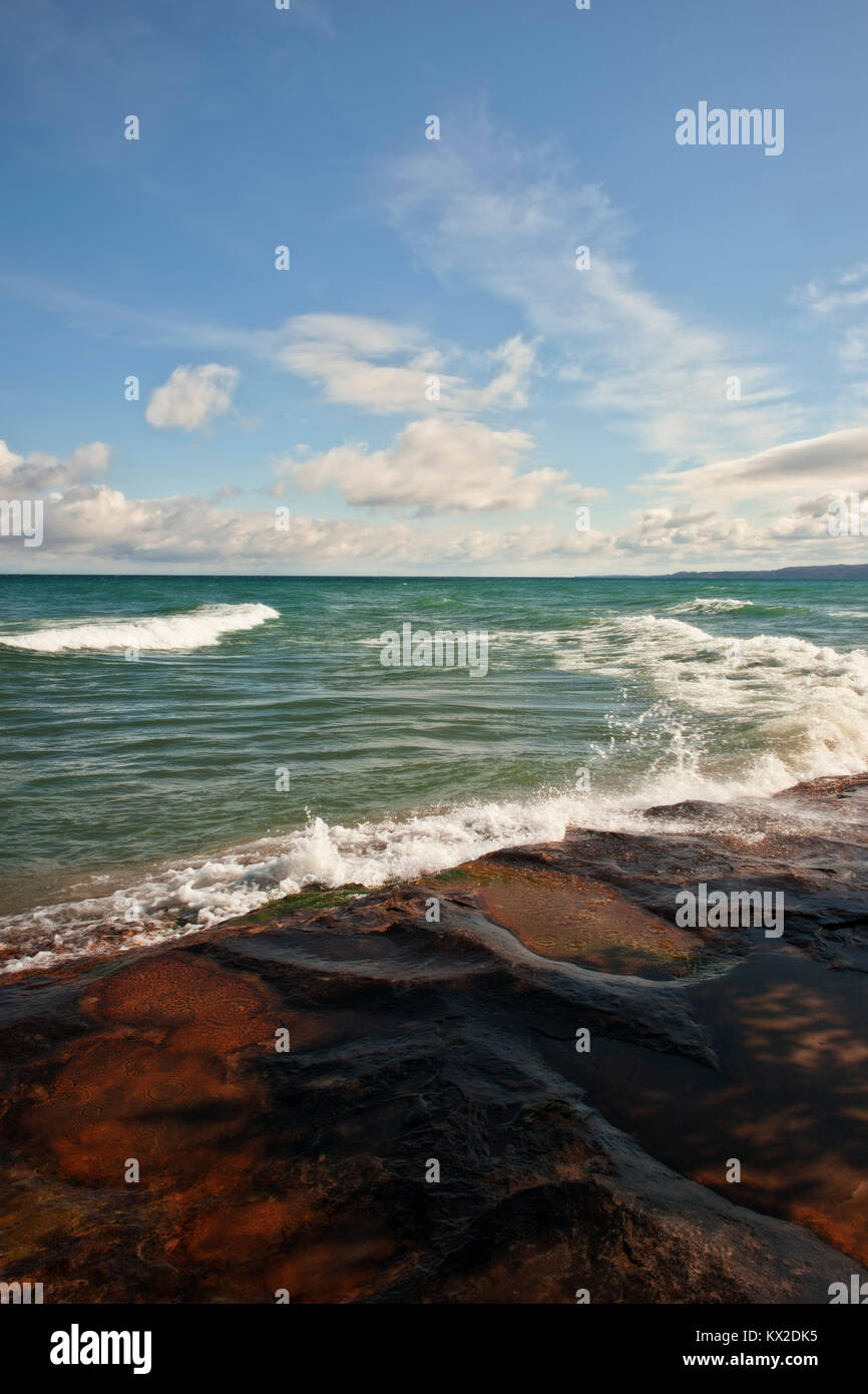 Various autumn clouds form over Lake Superior along Pictured Rocks ...