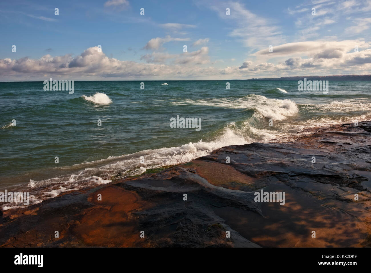 Various autumn clouds form over Lake Superior along Pictured Rocks ...