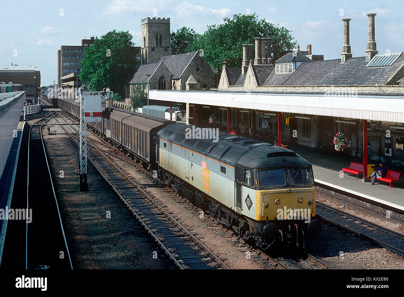 A class 47 diesel locomotive number 47241 working a train of empty vans ...