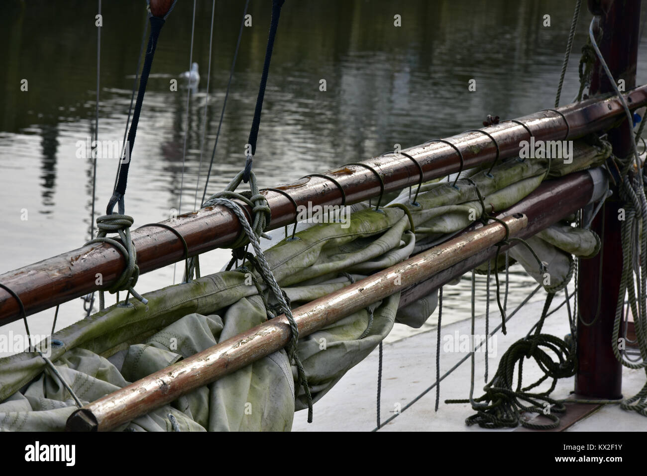 the boom, masts and spars of an old vintage traditional sailing boat or ...