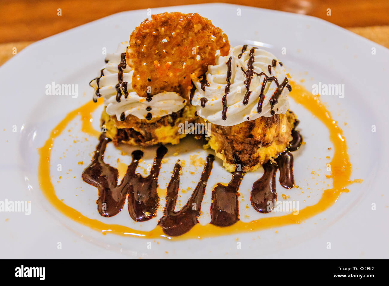 Somloi galuska. Traditional Hungarian dessert with whipped cream and ...