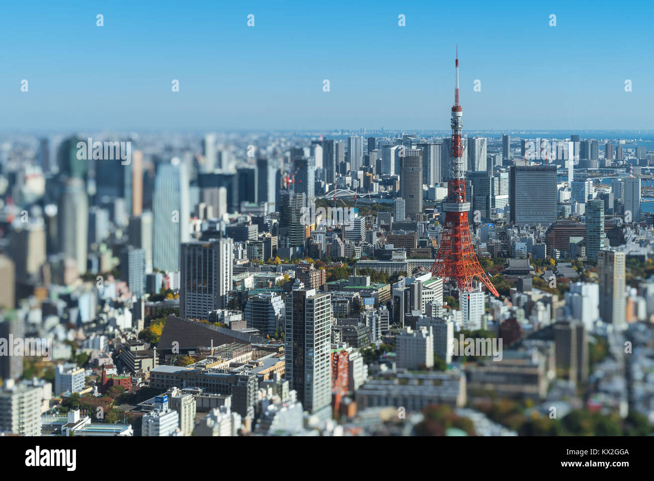 Tokyo tower with miniature blur city buildings around Stock Photo - Alamy