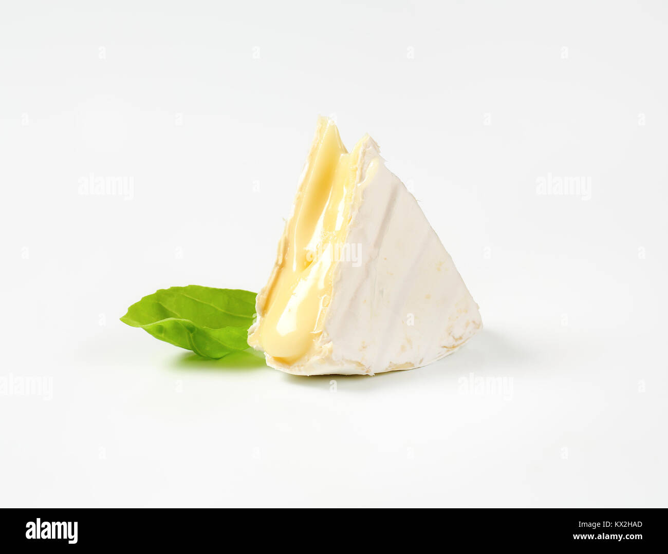 piece of soft-ripened cheese with white rind Stock Photo - Alamy