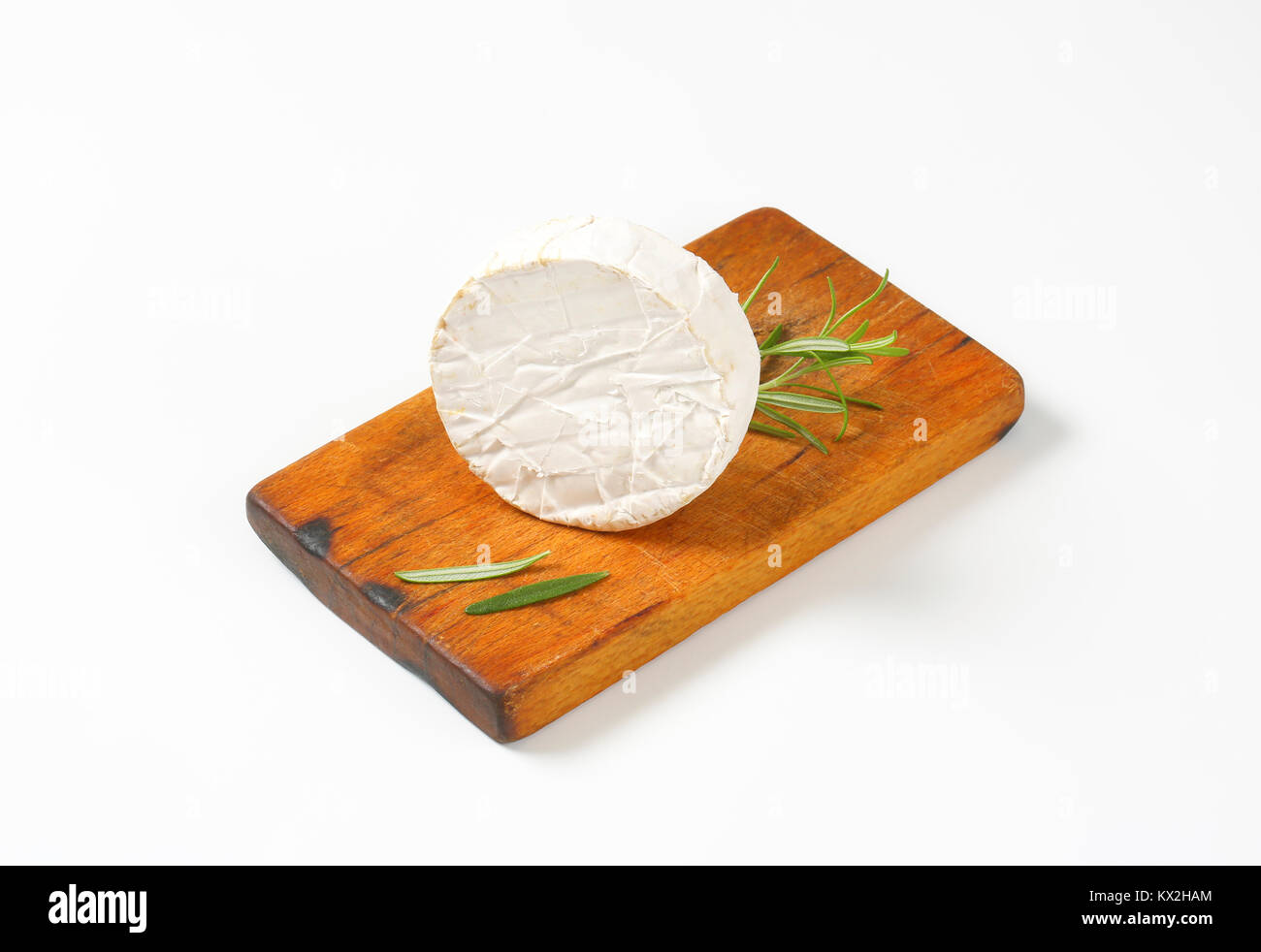 wheel of soft-ripened cheese with white rind Stock Photo - Alamy