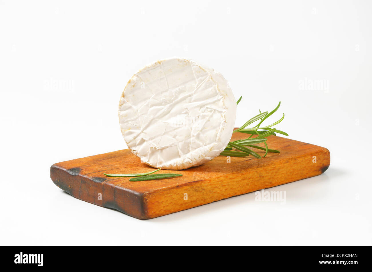 wheel of soft-ripened cheese with white rind Stock Photo - Alamy