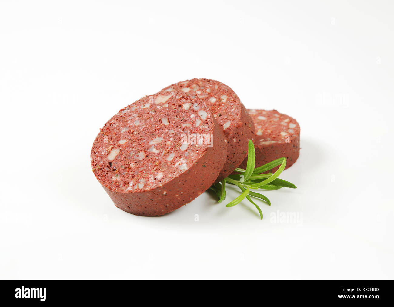 slices of blood sausage (black pudding) on white background Stock Photo ...