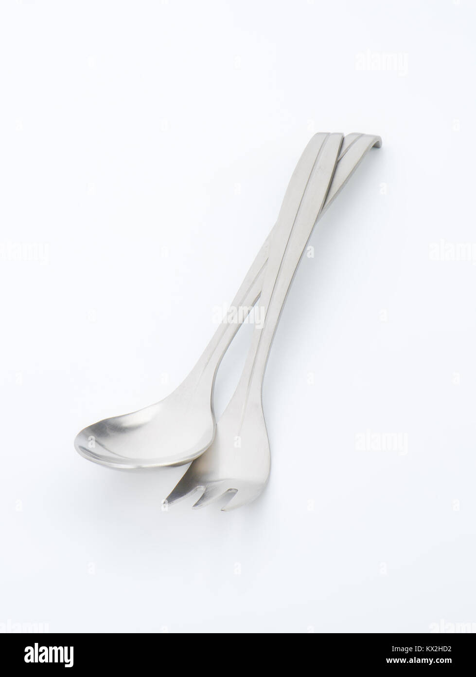 Metal spoon and three-pronged fork Stock Photo - Alamy